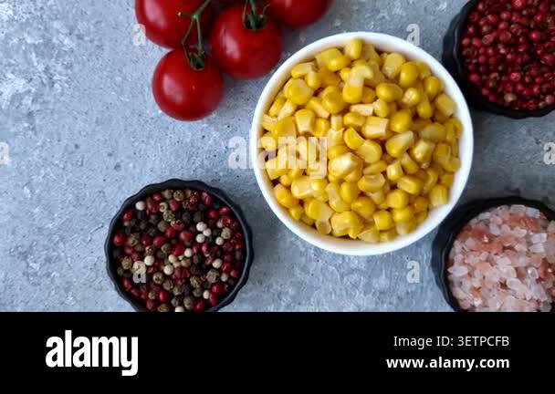 Golden, sweet canned corn kernels or maize for salads and vegetarian ...