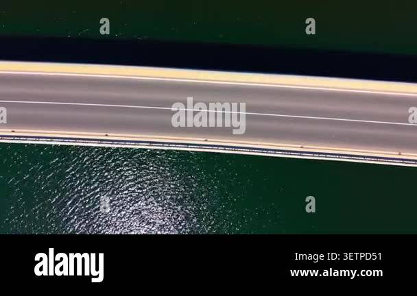 Road surface on bridge. Close up overhead shot of asphalt lane and ...
