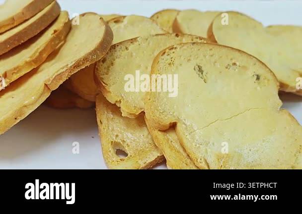 Macro shot of crispy baked bread rusks and toast texture background ...