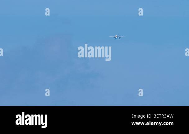 Passenger airplane flying and descending on final approach with landing ...