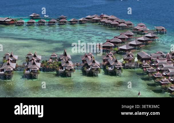 Mabul Island Beautiful Luxury Resort in a blue sea with a coral reef ...