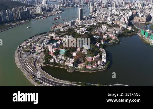 Expansive aerial view of the macau peninsula cityscape, showing the ...