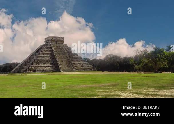 Fast-moving clouds passing over the ancient mayan pyramid of el ...