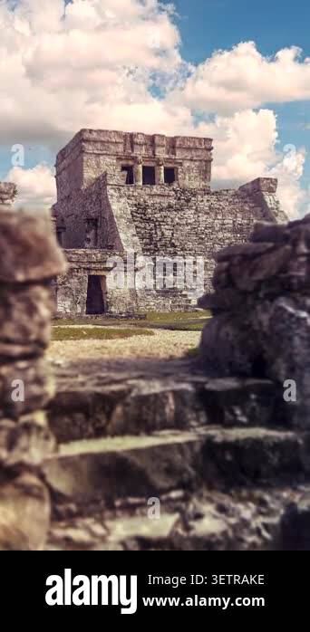 Majestic mayan ruins of tulum with white clouds moving rapidly across ...