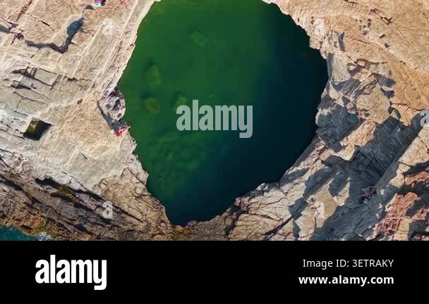 Aerial view of the famous natural rock pool filled with emerald green ...
