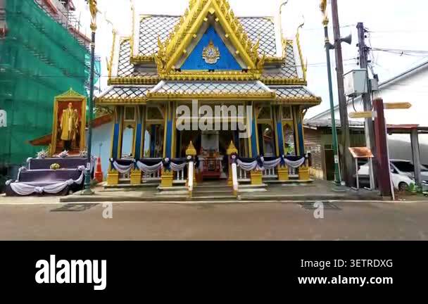 Beautiful Ratchapatanusorn Shrine temple featuring gold and blue ...