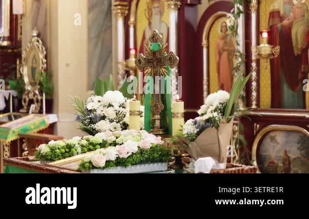 The altar cross in the interior of the church. The church cross lie on ...