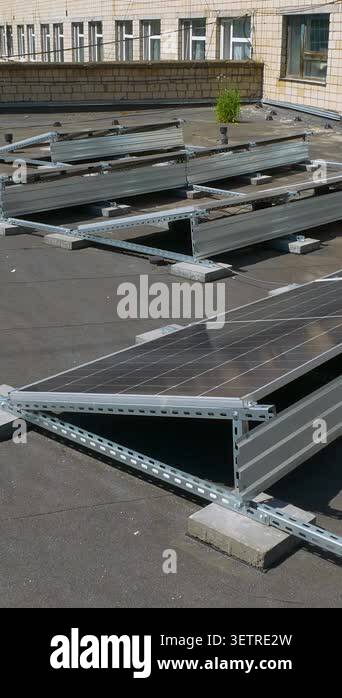 The Concept of Green Energy in an Urban Environment. Solar panels on ...