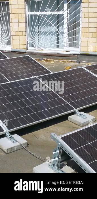The Concept of Green Energy in an Urban Environment. Solar panels on ...