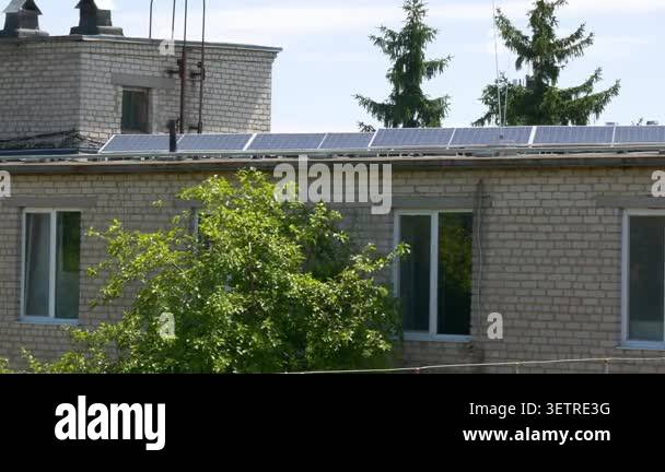 The Concept of Green Energy in an Urban Environment. Solar panels on ...