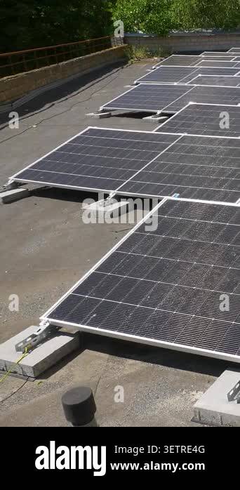 The Concept of Green Energy in an Urban Environment. Solar panels on ...