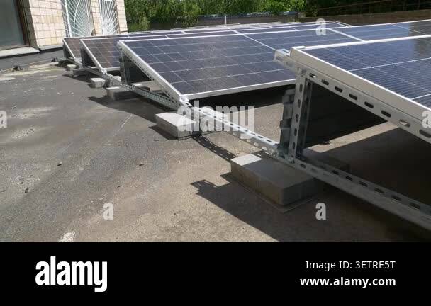 The Concept of Green Energy in an Urban Environment. Solar panels on ...