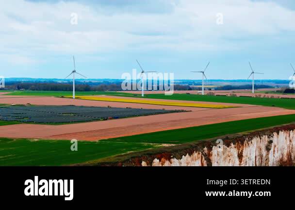 Wind power and solar energy installation in Normandy countryside ...