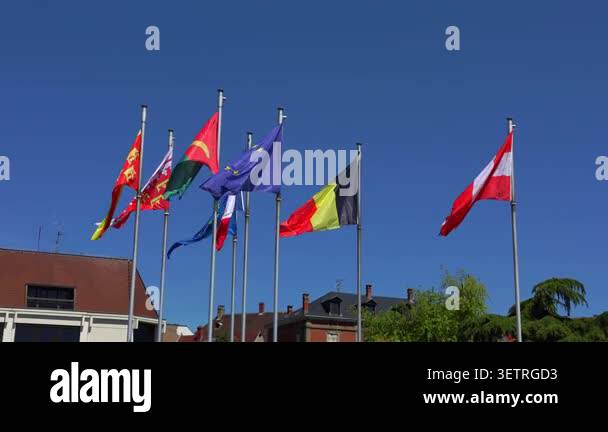 Colmar, France, May 23, 2026: Flags of various countries waving in the ...