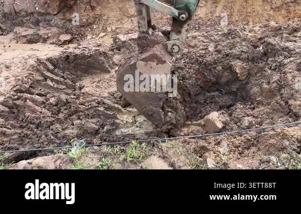 Chronological capture of an industrial excavator's relentless digging ...