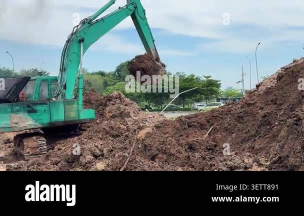 heavy heavy construction worker on the road at work Stock Video Footage ...
