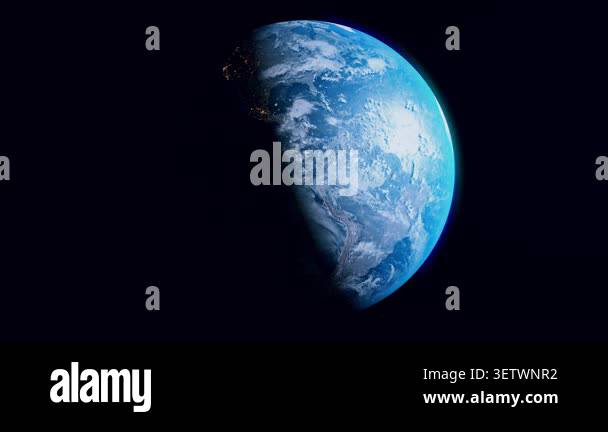 Planet Earth floats in the dark void of outer space with half of the ...