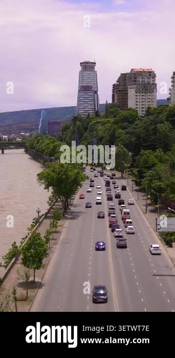 Aerial view of cars and vans driving on a busy highway along the ...