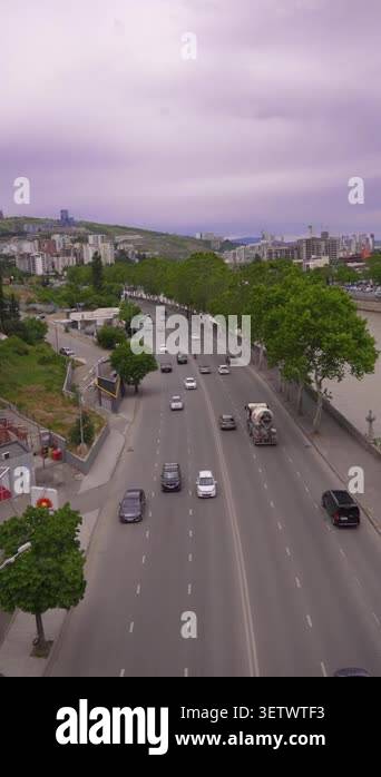 Aerial view of cars and vans driving on a busy highway along the ...