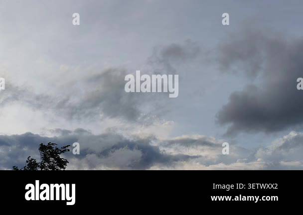 Fast moving dark storm clouds with strong wind before heavy rain in the ...