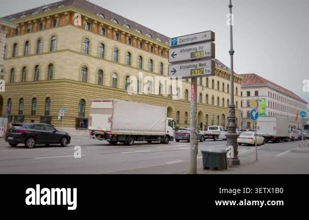 Munich City Street With Direction Signs And Historic Buildings. High ...