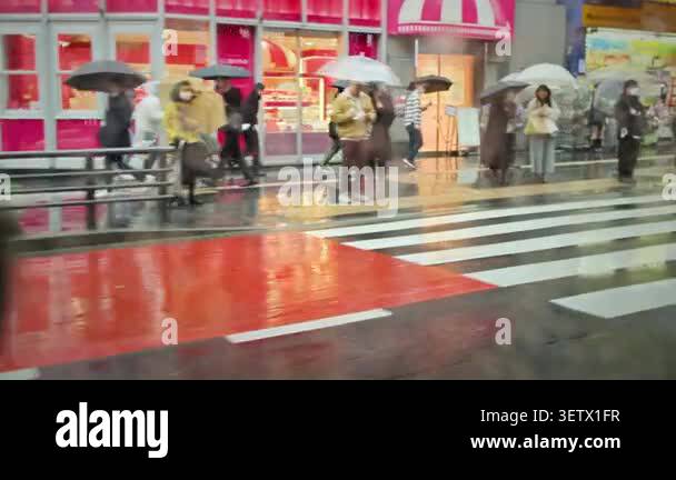 Tokyo Japan February 23, 2026: Raindrops On Car Window Pedestrians ...