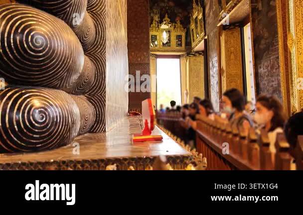 Wat Pho Reclining Buddha Toes And Sole Detail With Visitors. High ...