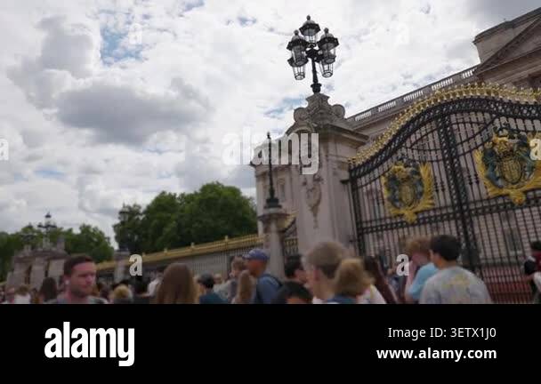 Buckingham Palace Gate And Lamp Posts Below Cloudy Sky. High quality 4k ...