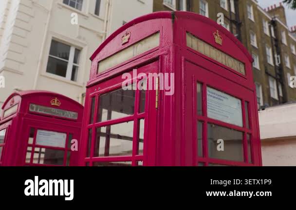 London Red Telephone Boxes On City Sidewalk Close Up. High quality 4k ...
