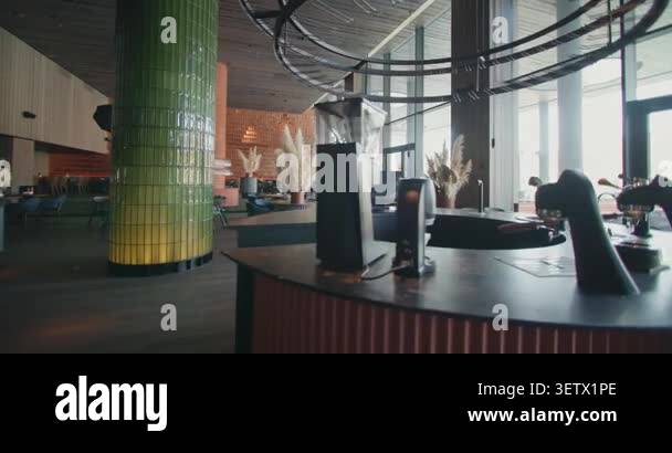 The video highlights a vibrant restaurant with a spacious, welllit room ...