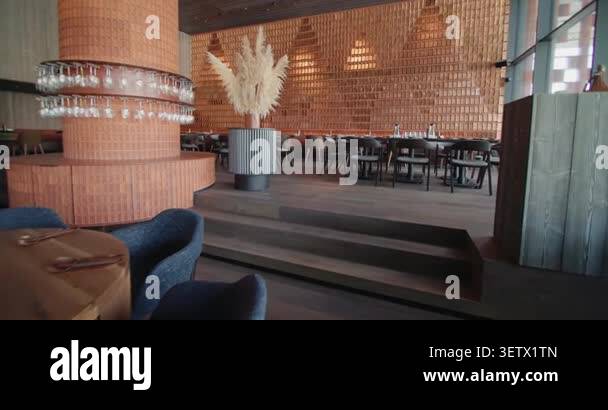 This video showcases a cozy restaurant with rustic brick walls and ...
