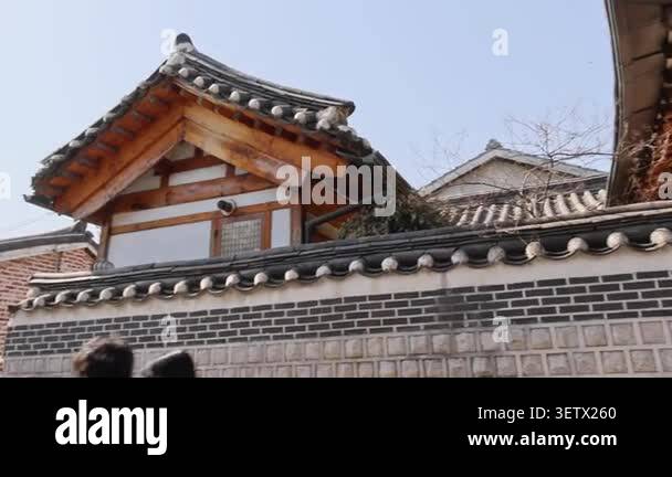 Seoul Hanok Rooflines Above Traditional Stone Wall. High quality 4k ...