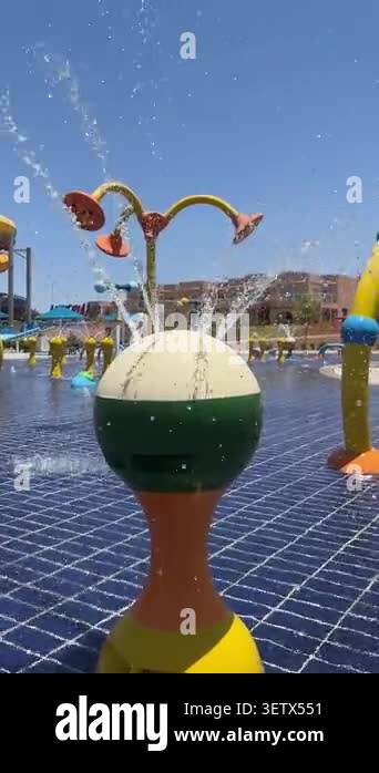 Colorful water spray feature a sunny outdoor water park on June 20 ...
