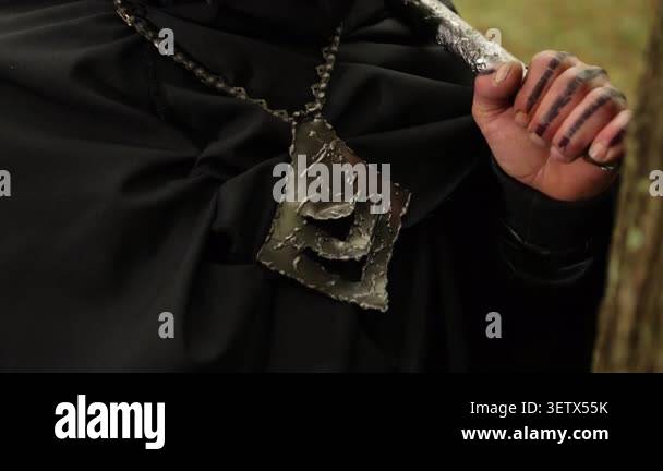 Weapon handle, Pendant chain, Metal jewelry. Rugged metal pendant on ...