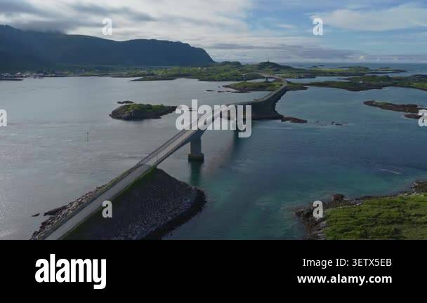 Stunning aerial footage of a curved causeway bridge connecting islands ...