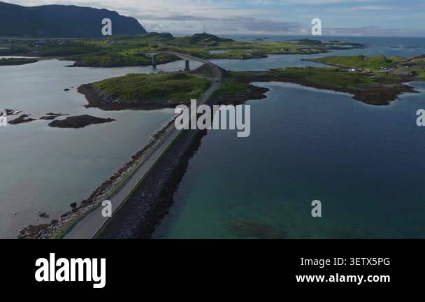 Stunning aerial view of a modern causeway road bridge connecting small ...