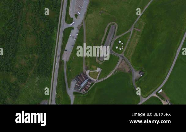 Aerial drone footage of a modern rest stop and parking area in Lofoten ...