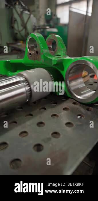 Metal part in workshop during machining process, demonstrating ...