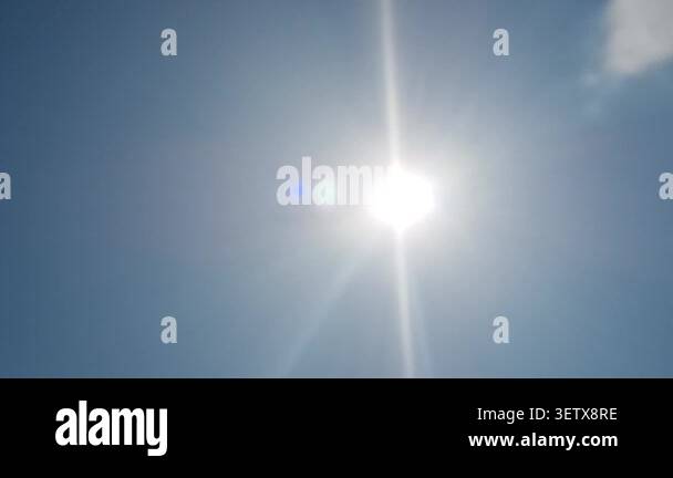 sun summer beams blue sky Stock Video Footage - Alamy