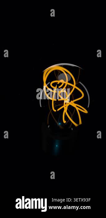 Portrait orientation of the high-angle view of a cybernetic light bulb ...