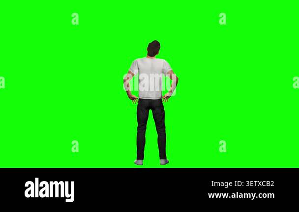 Man standing calmly between workout movements on green screen chromakey ...