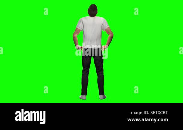 Male fitness model standing confidently after exercise on green screen ...