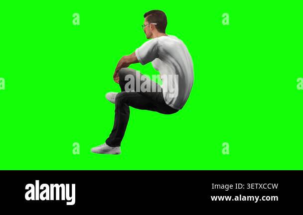 Male character seated floating pose on green screen chromakey ...