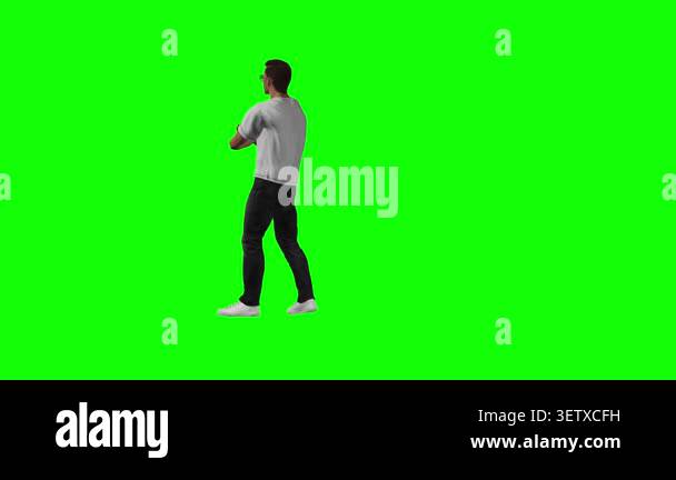 Front view of male model walking forward with confident catwalk style ...