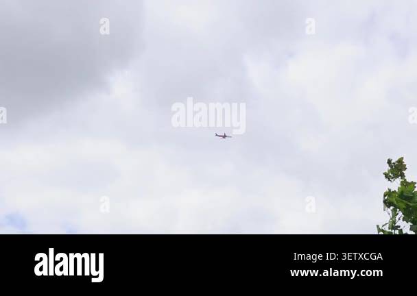 Airplane flying in cloudy sky background. Passenger commercial aircraft ...