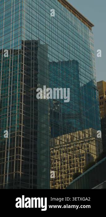 HONG KONG, CHINA - MAY 19 2025: J P Morgan High skyscraper with mirror ...