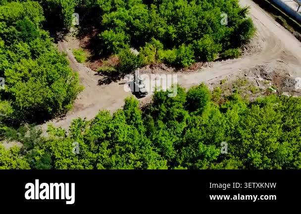 Aerial drone view of a mobile geotechnical drilling rig conducting soil ...