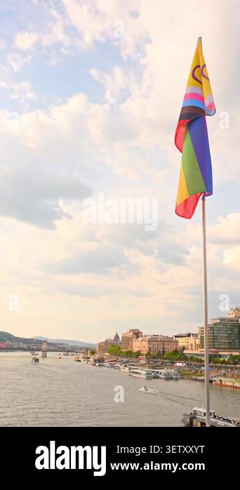 Budapest, Hungary - June 20, 2026. Progress Pride flag displayed above ...