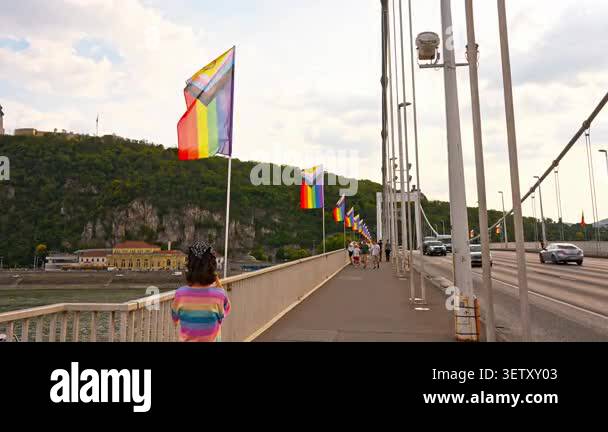 Budapest, Hungary - June 20, 2026. Pride flags displayed along a bridge ...
