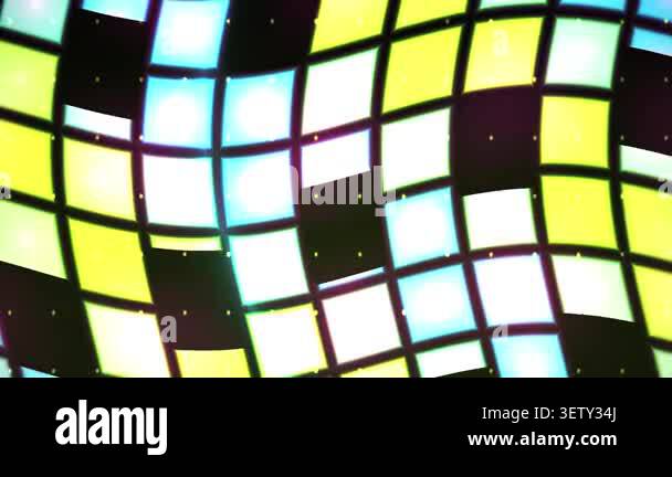 A shiny disco ball with a grid pattern reflecting colorful lights ...